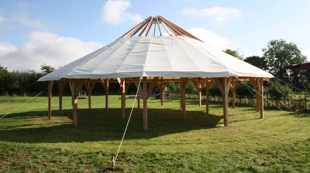 12m-Roundhouse-Roof-Half-Covered-2 - Honeycomb Marquees