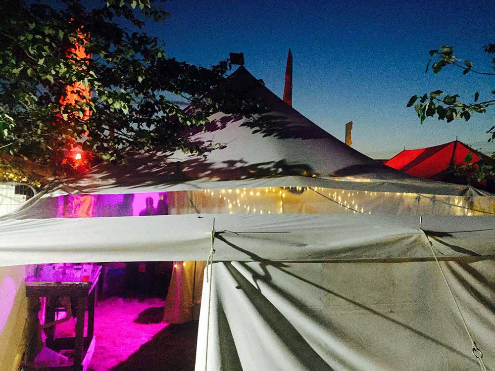 Canopy-at-Night-shot-from-the-outside-looking-in - Honeycomb Marquees